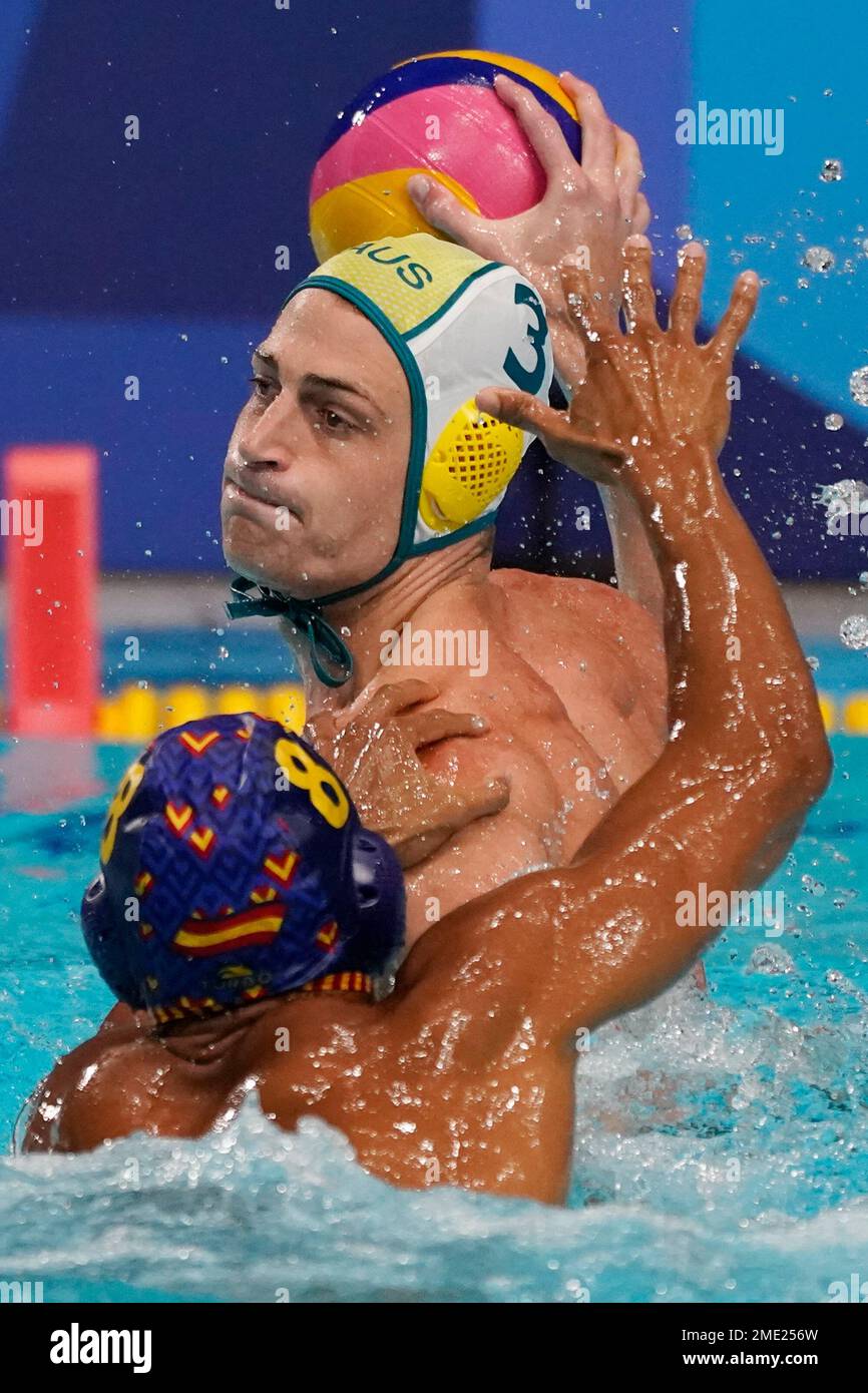 Australia's George Ford (3) is defended by Spain's Francisco Fernandez ...
