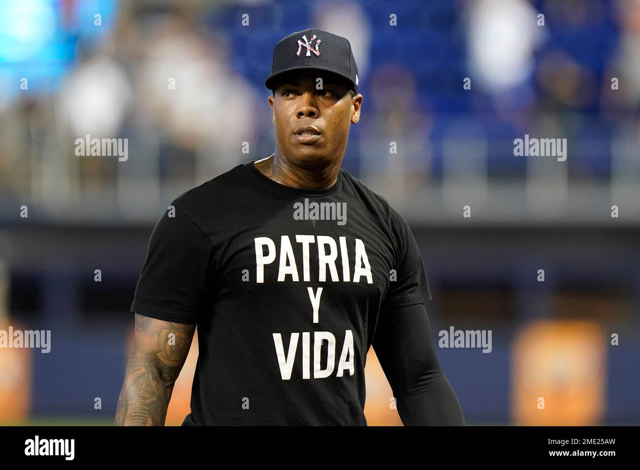 New York Yankees relief pitcher Aroldis Chapman walks on the field ...