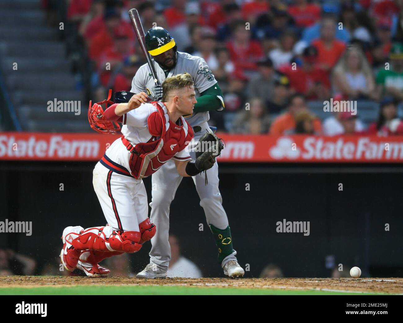 Los Angeles Angels catcher Max Stassi runs after a deflected pitch ...
