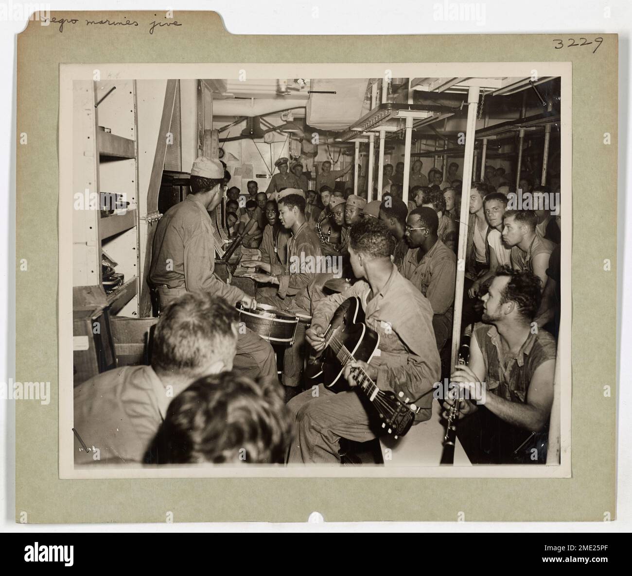African American Marines entertain U.S. Coast Guardsmen aboard a Coast ...
