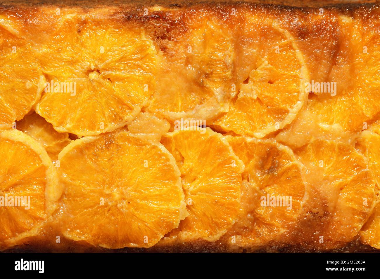 Close up of orange cake. Full frame shot Stock Photo - Alamy