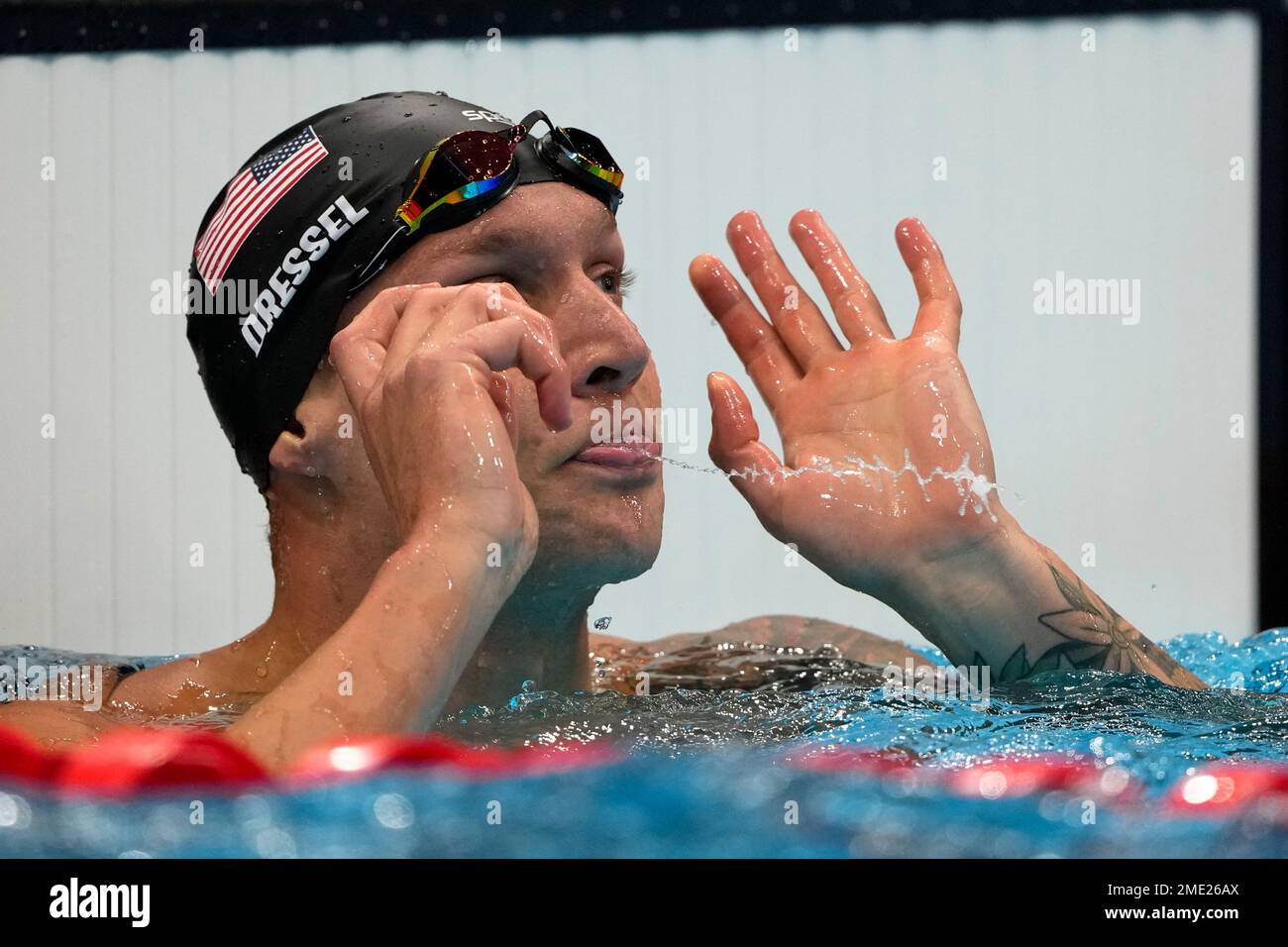 Caeleb Dressel, of United States, finishes a men's 50-meter freestyle ...