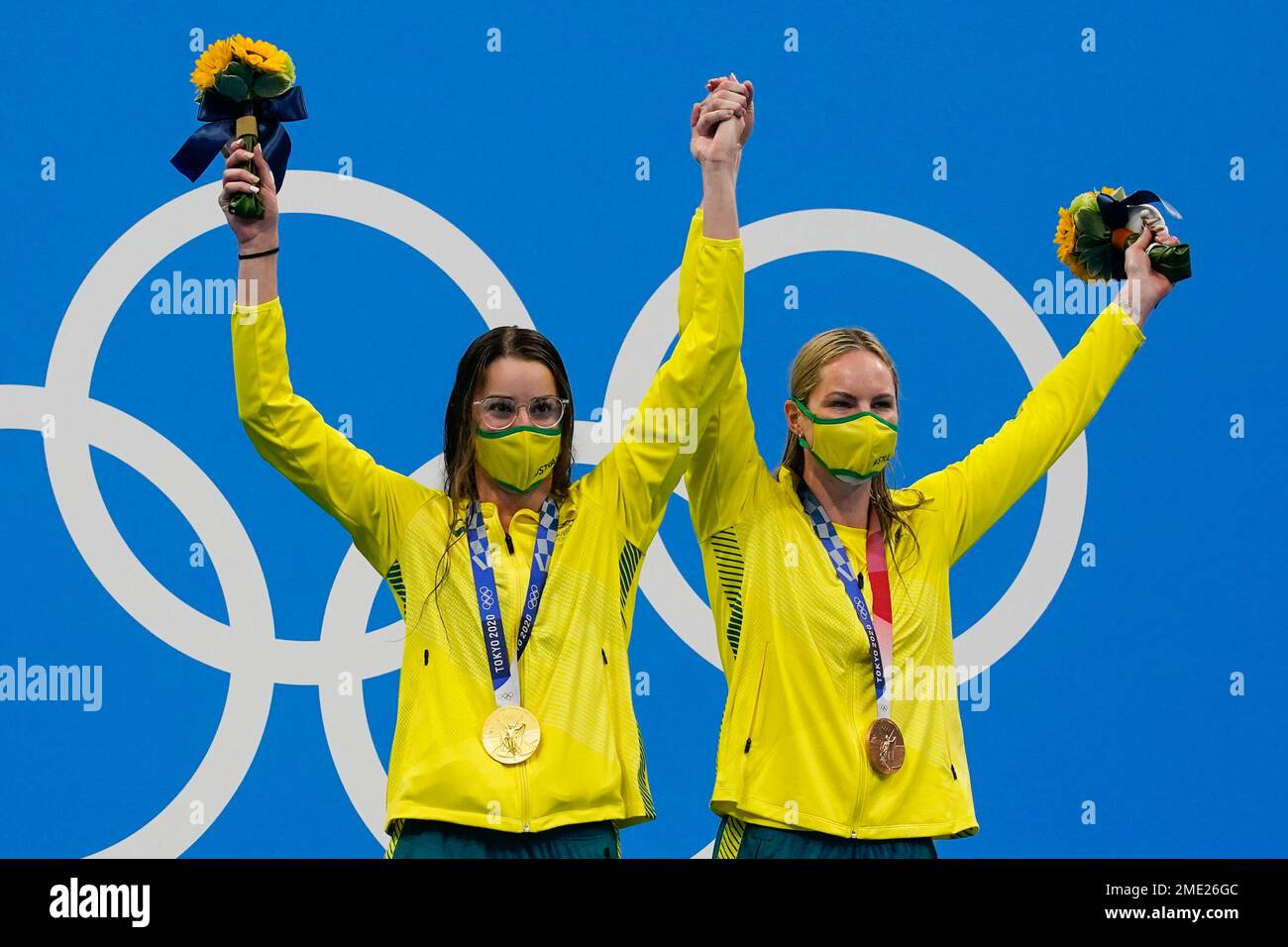 Kaylee Mckeown, of Australia, left, poses with teammate Emily Seebohm ...