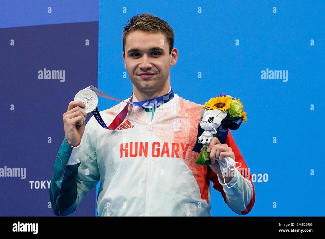 Kristof Milak, of Hungary, poses after winning the silver medal in the ...