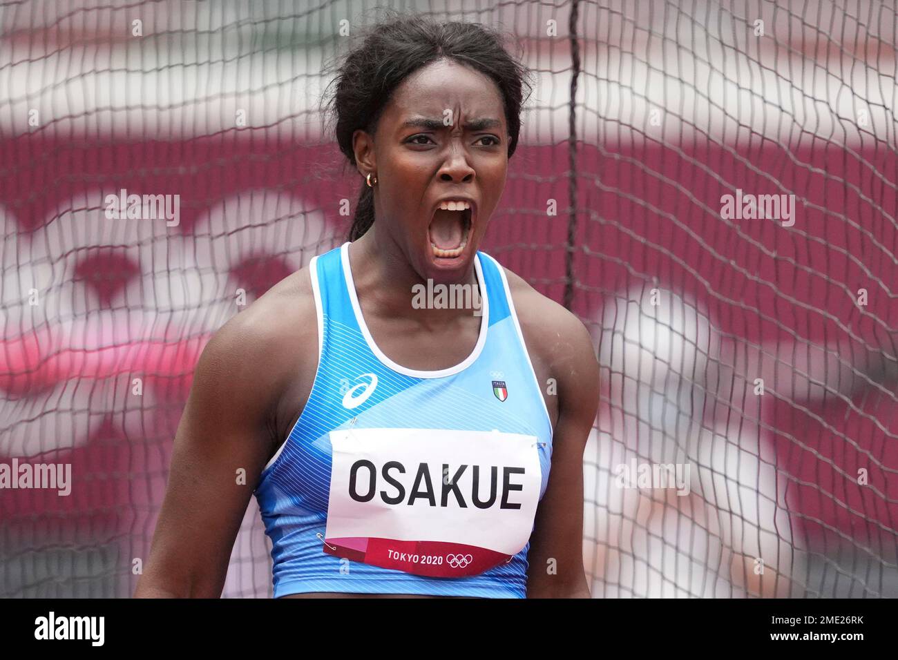 Daisy Osakue, of Italy, reacts following her throw during the ...