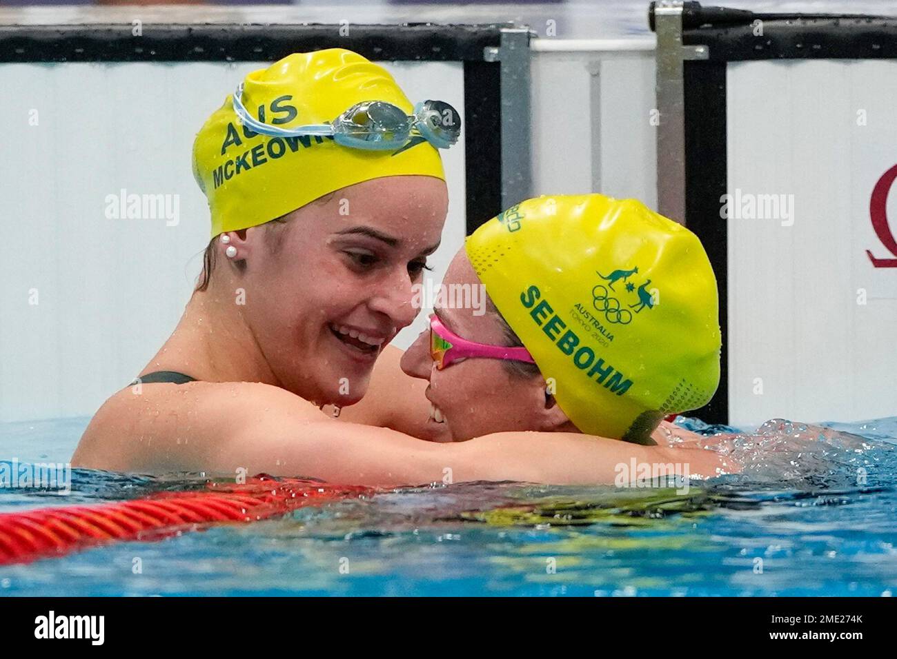 Kaylee Mckeown, of Australia, embraces teammate Emily Seebohm after ...