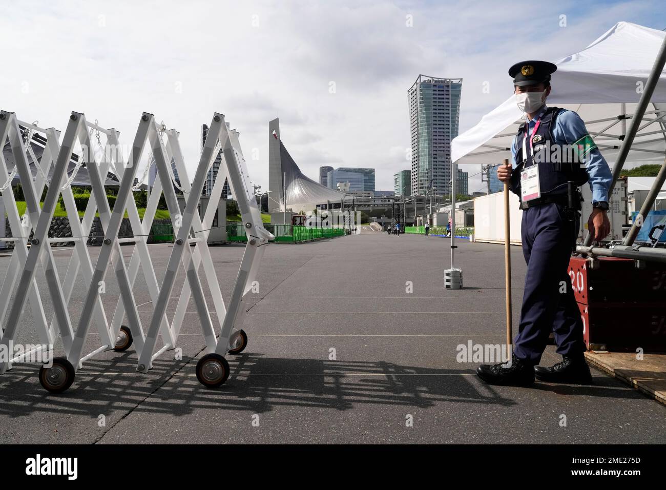 A police officer guards at the entrance of the Yoyogi National Stadium ...