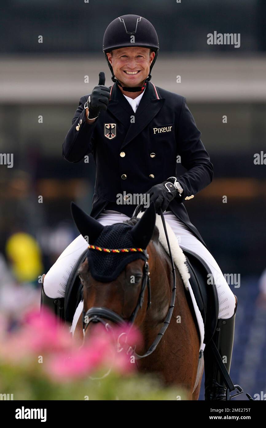 Germany's Michael Jung, riding Chipmunk FRH, gives a thumbs up after ...
