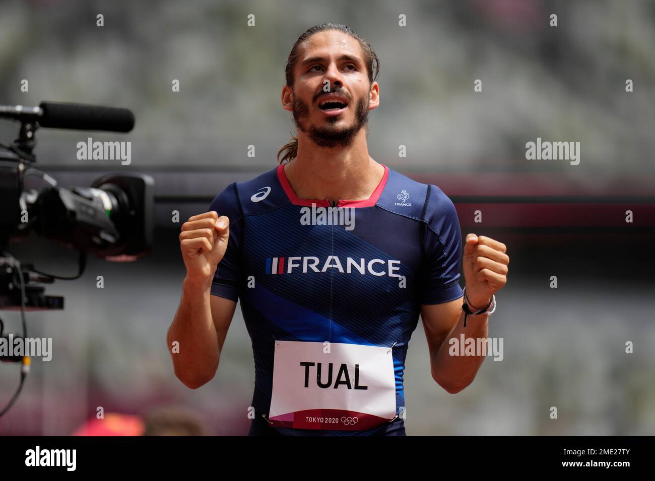 Gabriel Tual, of France, reacts after a heat in the men's 800-meter run ...
