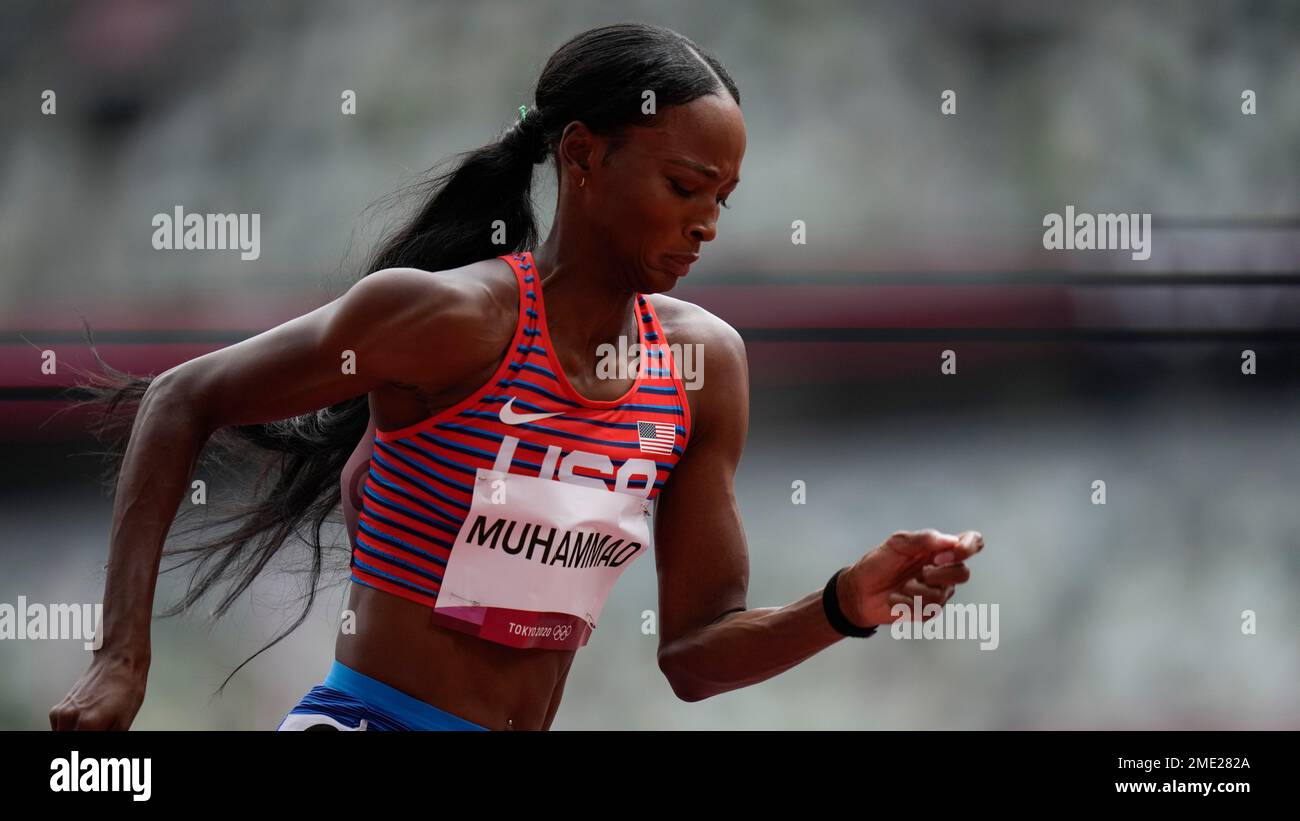 Dalilah Muhammad, of United States, wins a heat in the women's 400 ...