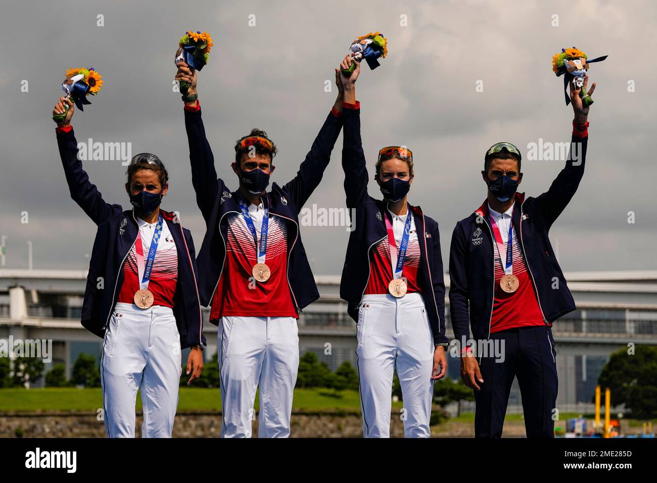 The team from France celebrate after winning the bronze medal in the ...
