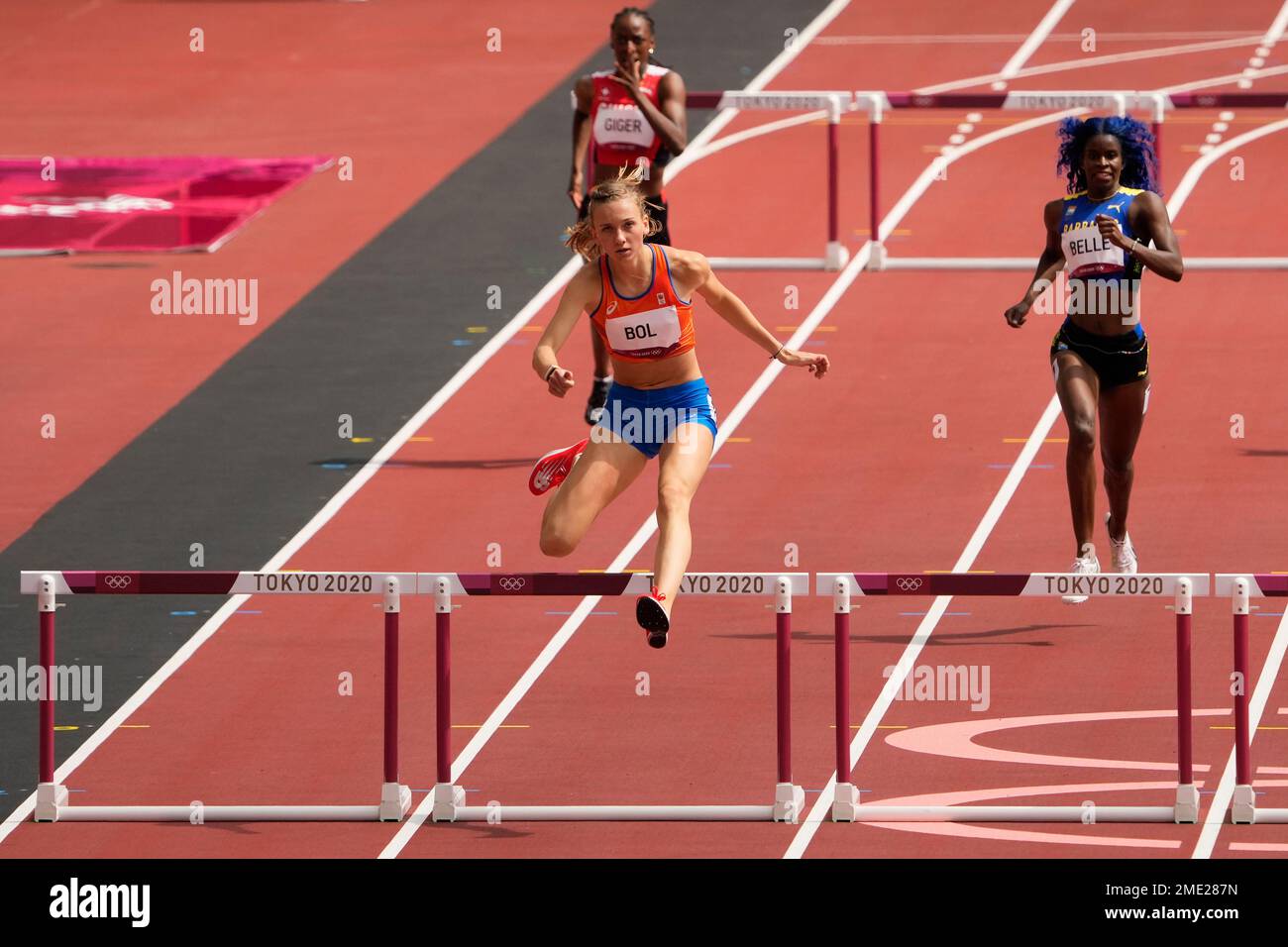 Femke Bol, of the Netherlands, wins a heat in the women's 400-meter ...