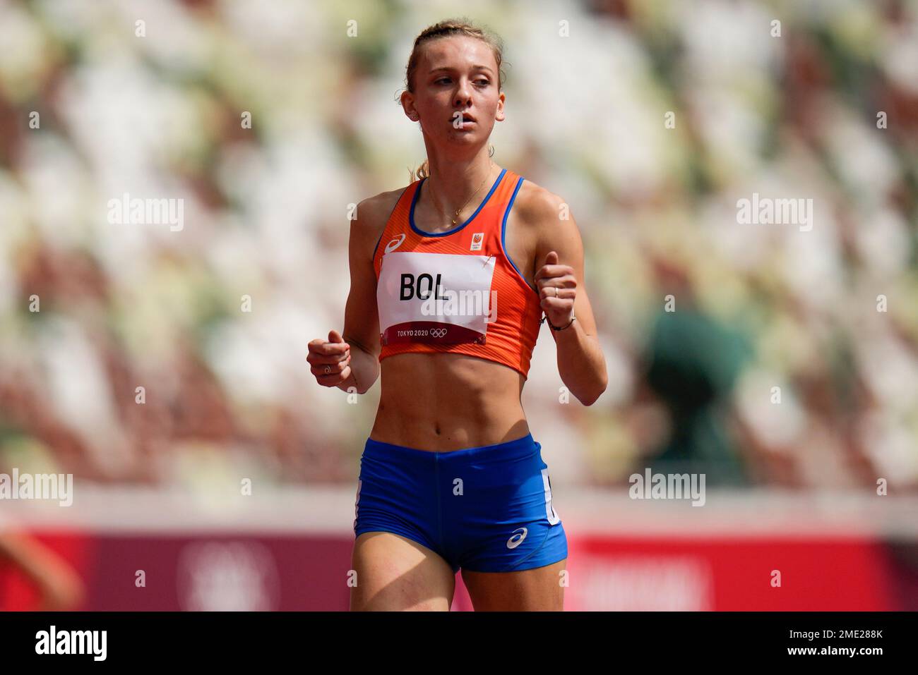 Femke Bol, of the Netherlands, wins a heat in the women's 400-meter ...