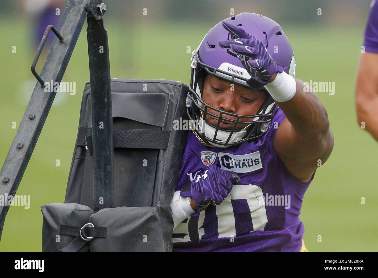 Minnesota Vikings fullback C.J. Ham hits an apparatus during NFL ...