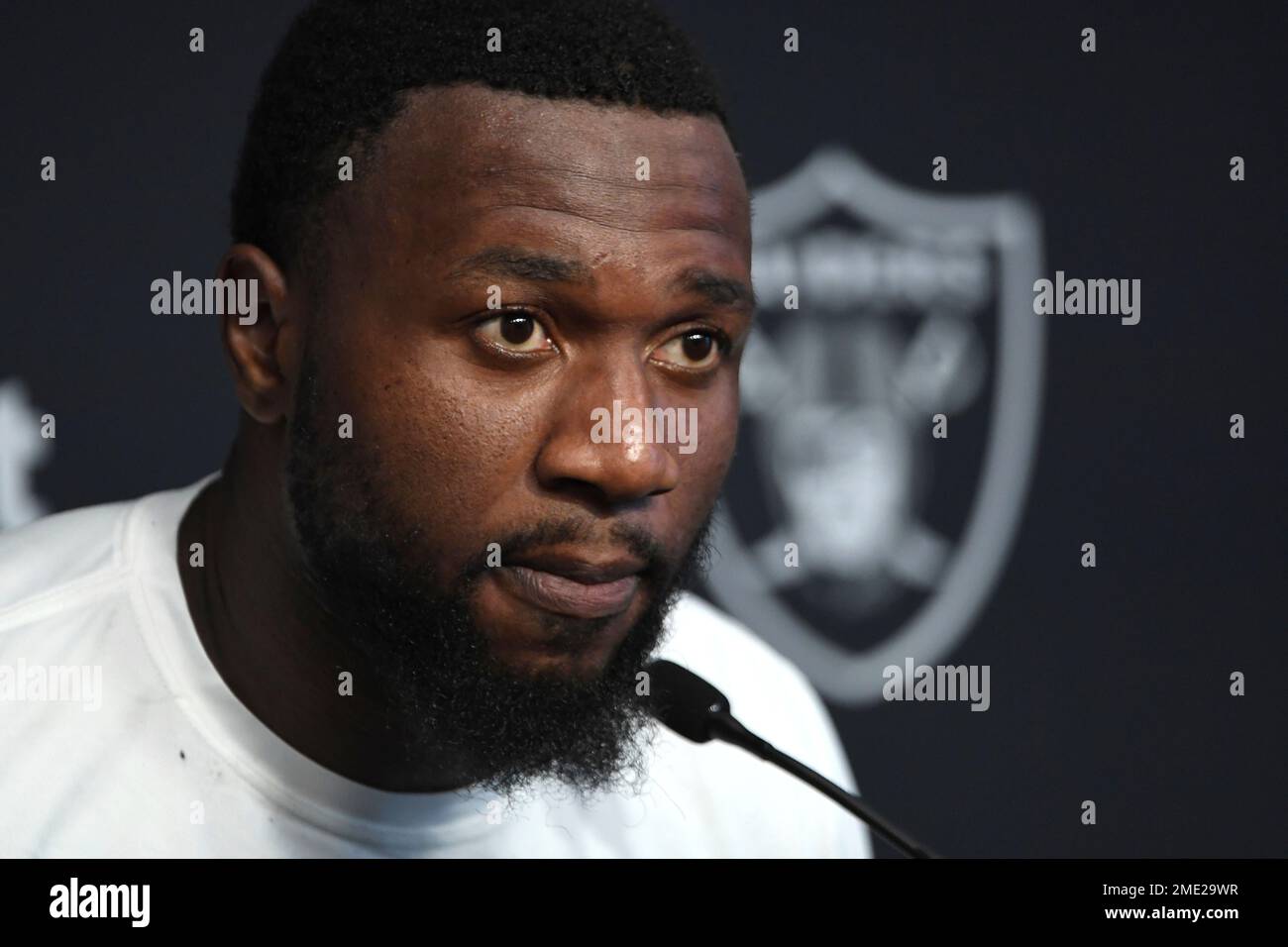 Las Vegas Raiders defensive end Yannick Ngakoue speaks to the media after an NFL football ...