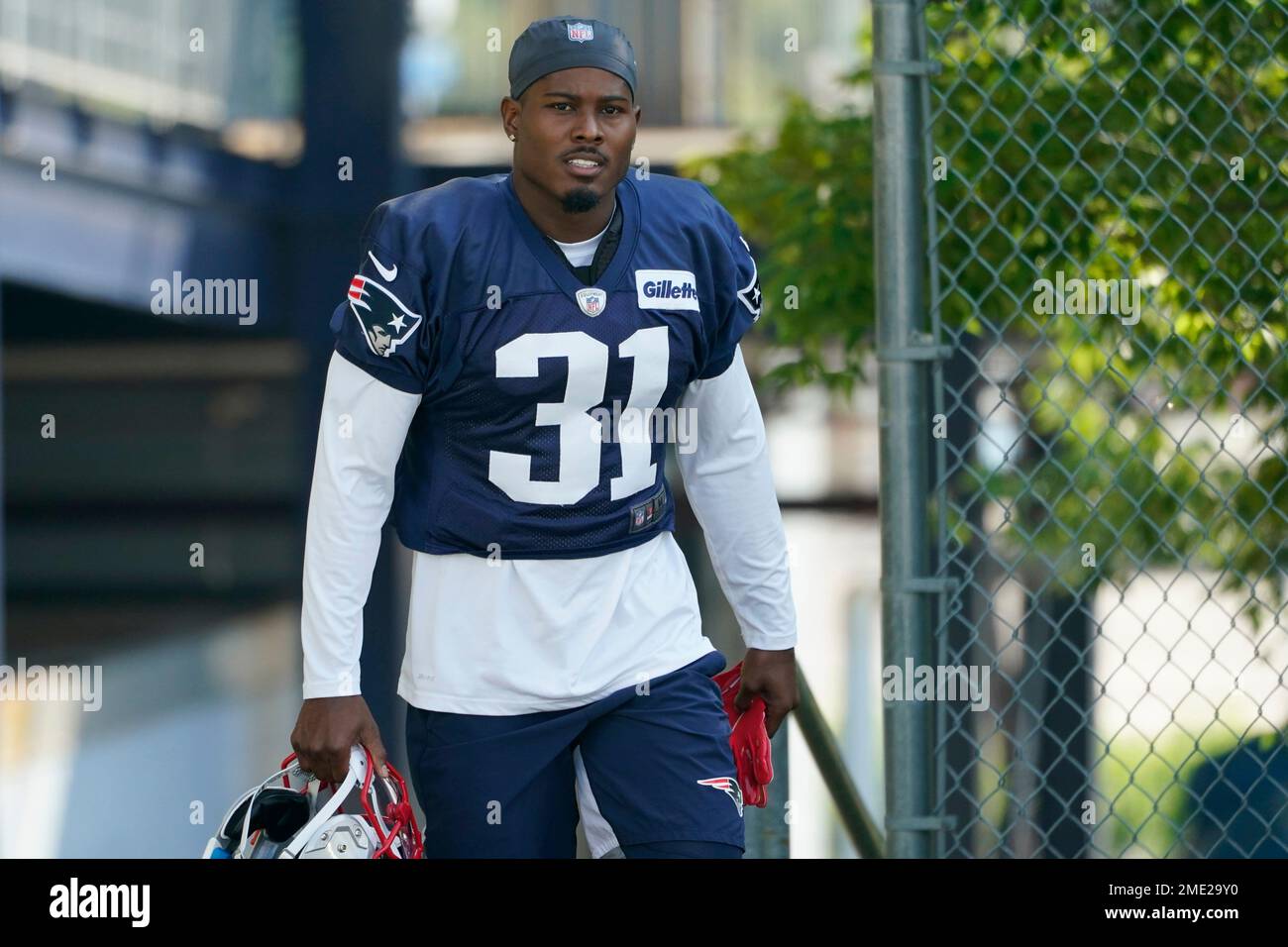 New England Patriots defensive back Jonathan Jones (31) walks to NFL ...