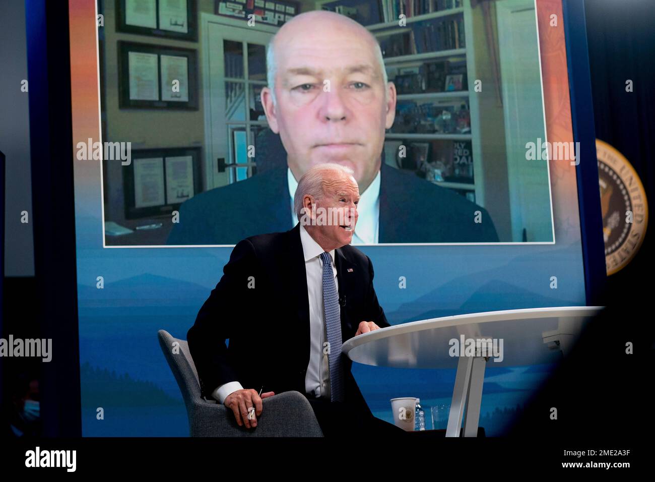 President Joe Biden speaks with Montana Gov. Greg Gianforte, via ...