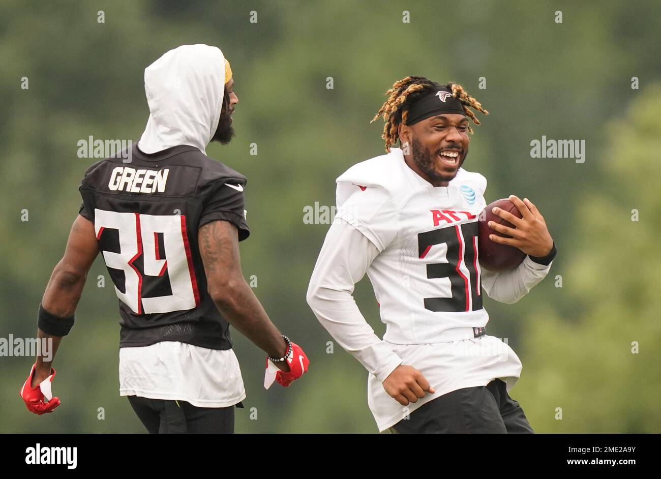 Atlanta Falcons running back Qadree Ollison (30) runs drills with ...