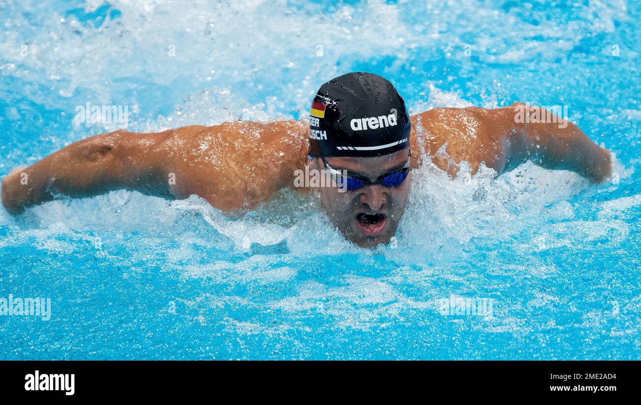 Germany's Marius Kusch swims in a men's 4x100-meter medley relay heat ...