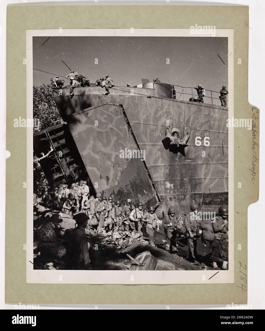 A Coast Guard-manned LST (Landing Ship, Tank) opens its massive ramp on ...