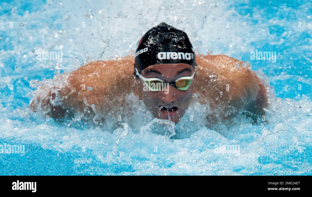Italy's Federico Burdisso swims in a men's 4x100-meter medley relay ...