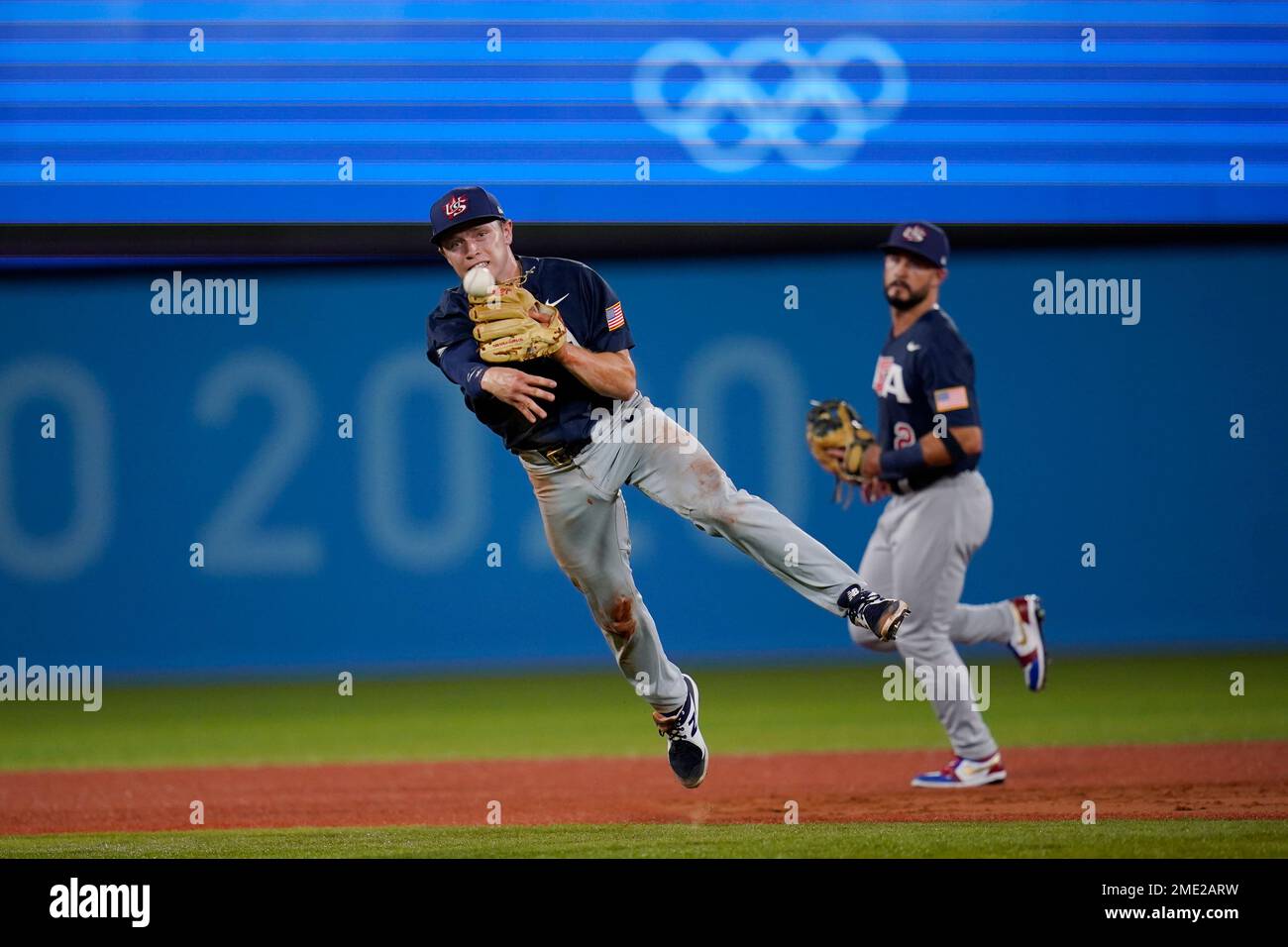 United States' Nick Allen throws to first base for an out on Israel's ...