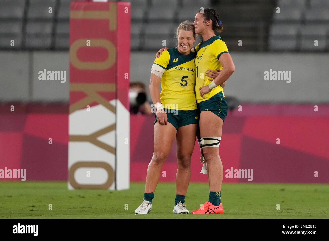 Australia's Demi Hayes, right, and Emma Tonegato, left, hug each other ...
