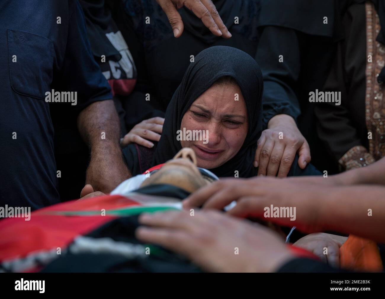 Palestinian mother Maha Awad, 47 cries while taking the farewell look ...