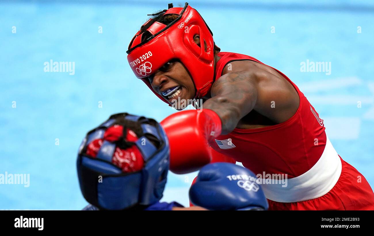 Oshae Jones, from the United States, right, exchanges punches with ...
