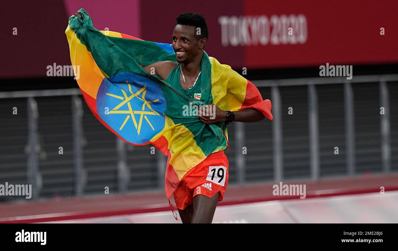 Selemon Barega, of Ethiopia, celebrates after winning the men's 10,000 ...
