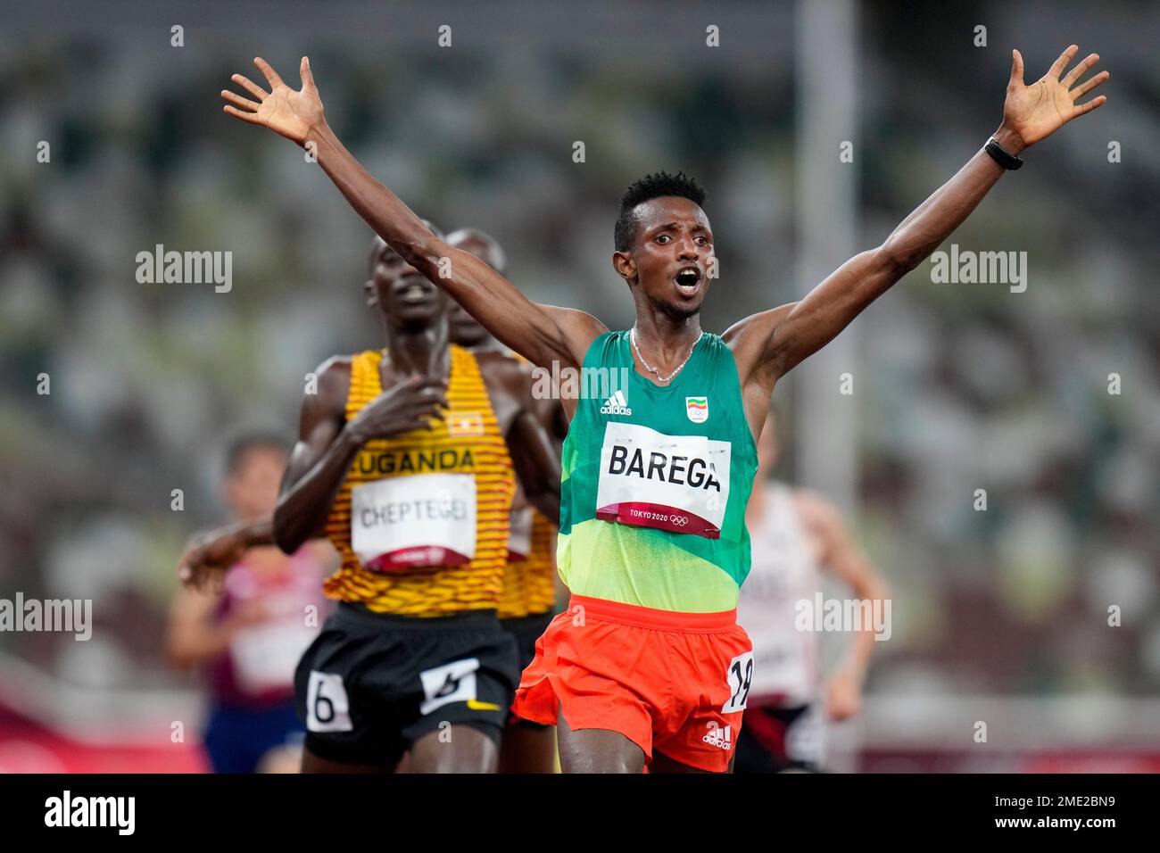 Selemon Barega, of Ethiopia, celebrates after winning the men's 10,000 ...