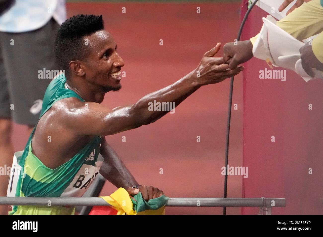 Selemon Barega, of Ethiopia, celebrates after winning the men's 10,000 ...