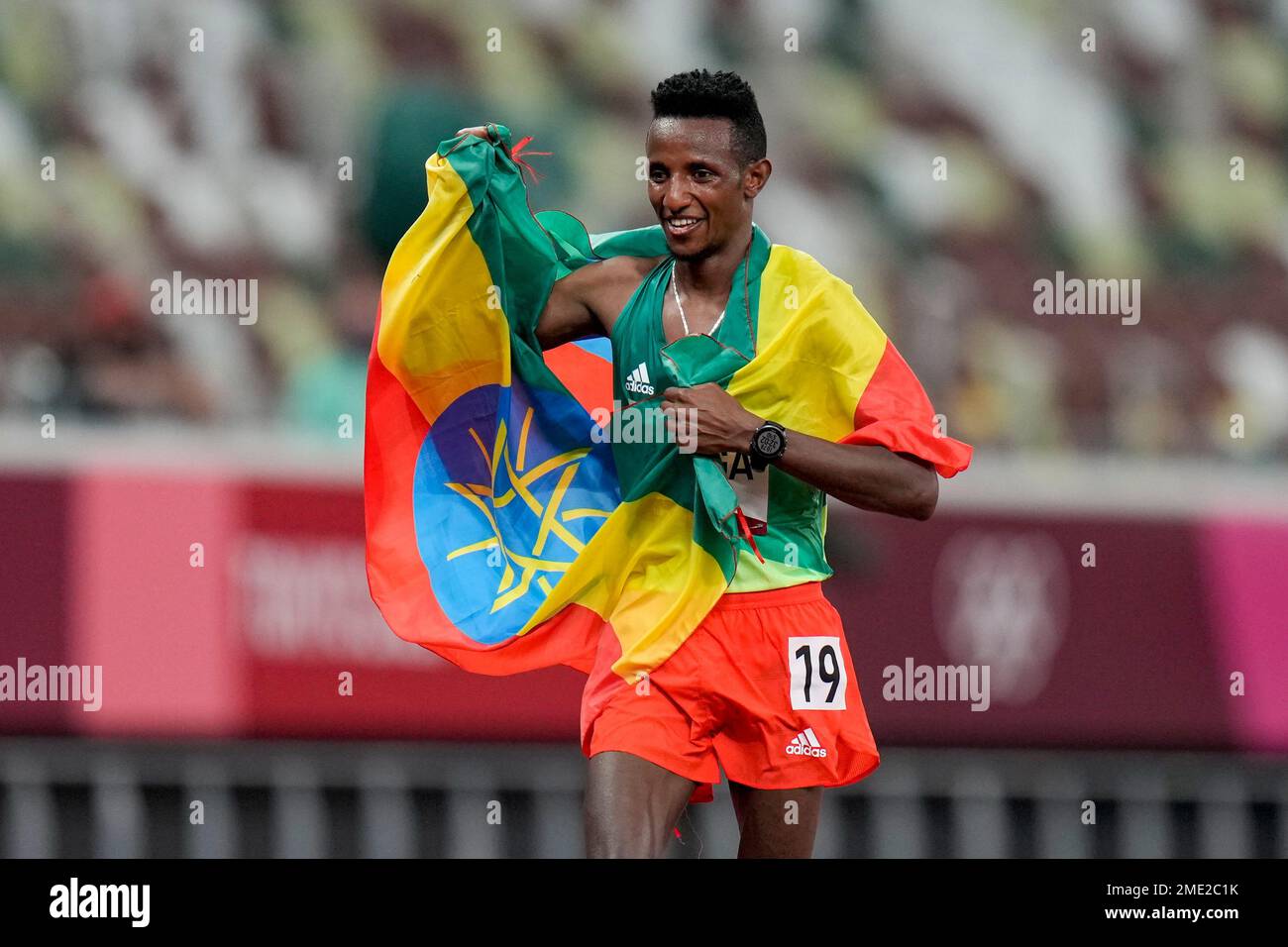 Selemon Barega, of Ethiopia, celebrates after winning the men's 10,000 ...