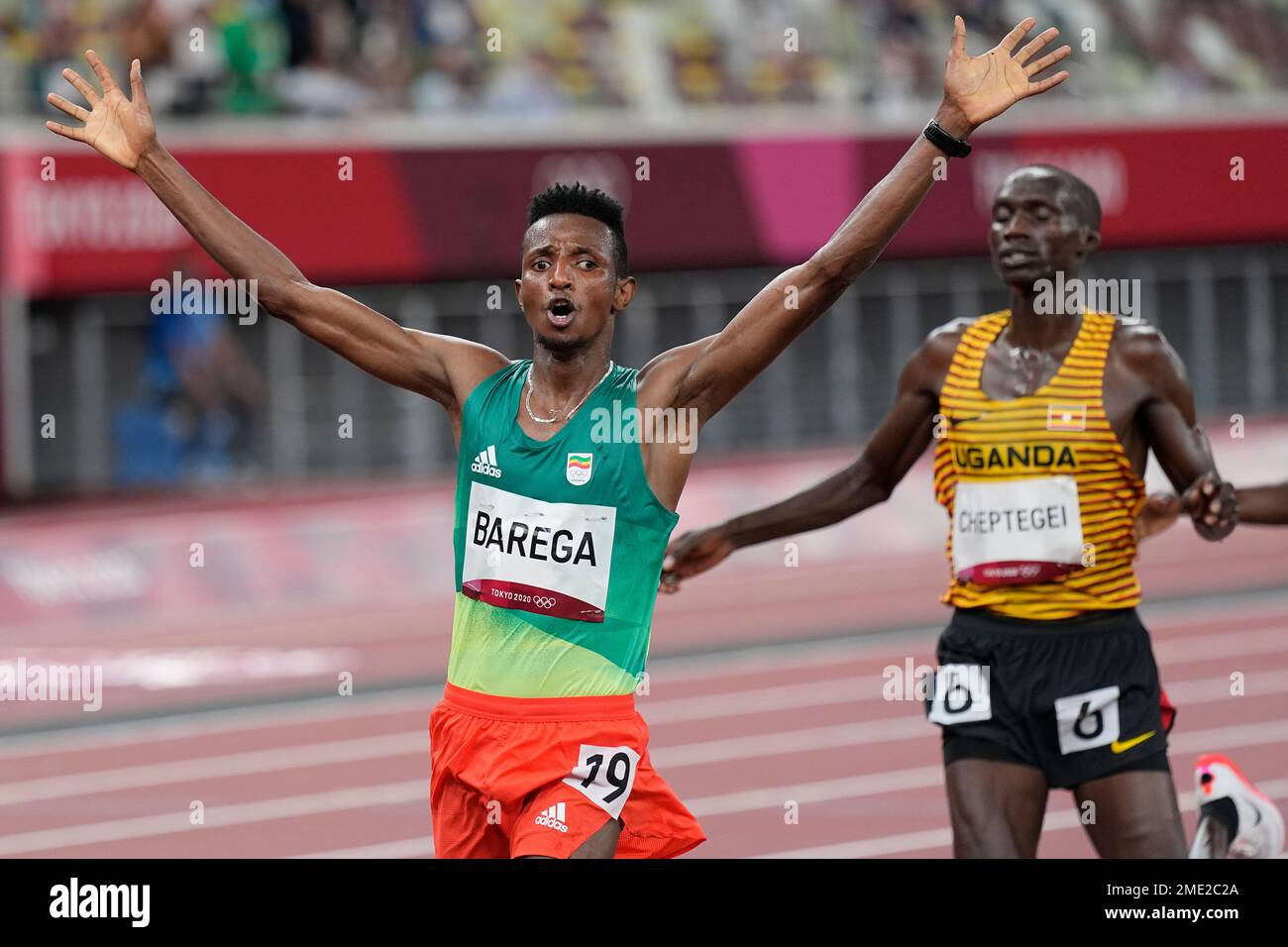 Selemon Barega, of Ethiopia, reacts as he wins the men's 10,000-meters ...