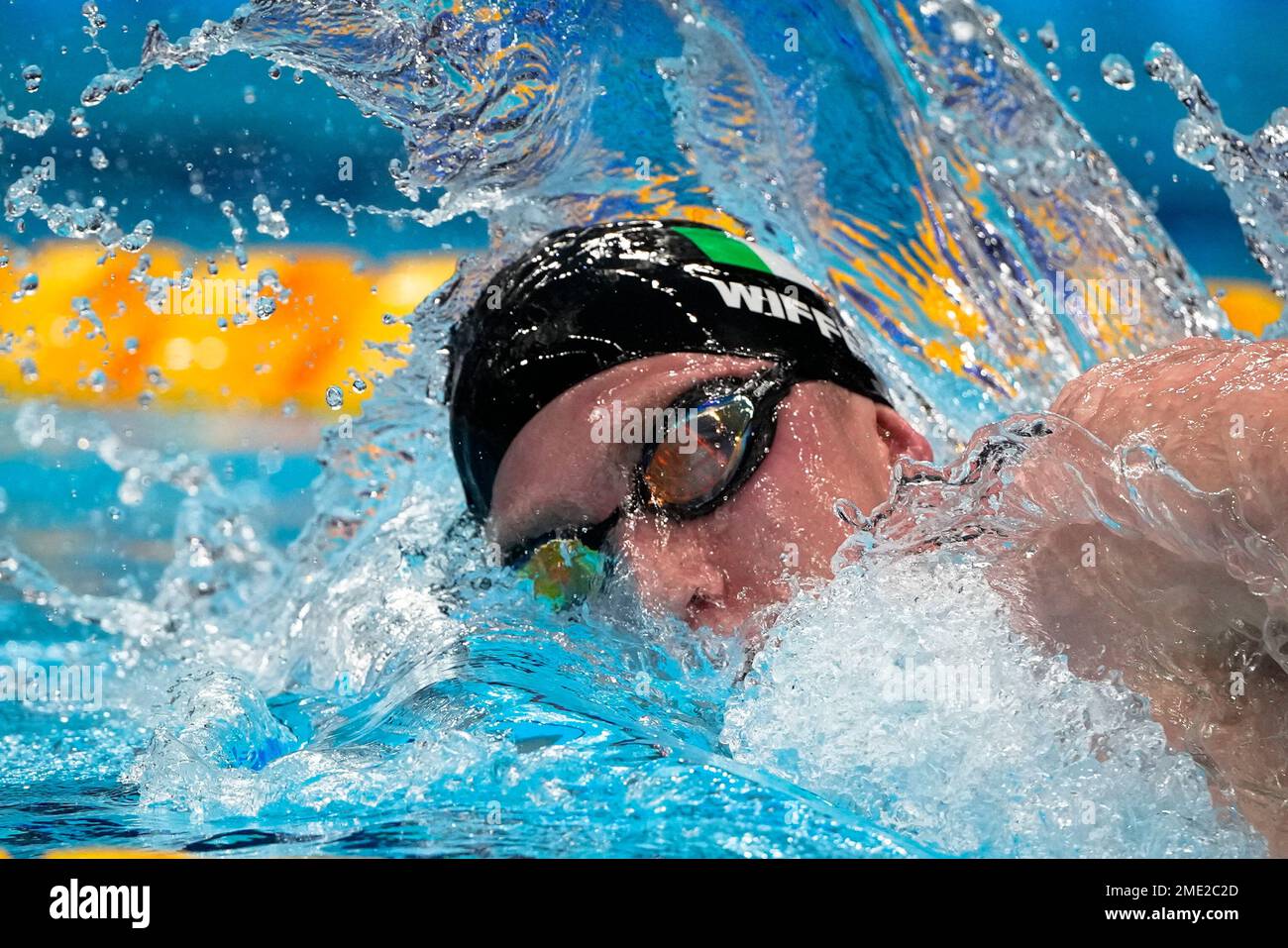 Daniel Wiffen, of Ireland, swims in a men's 1500-meter freestyle heat ...