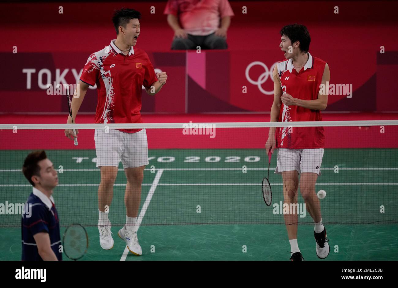 China's Li Jun Hui and Liu Yu, left, Chen celebrate a point against ...