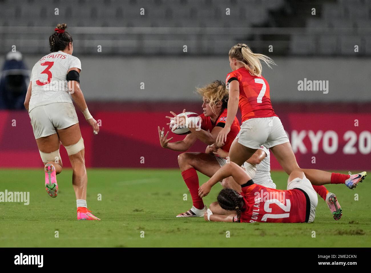 Britain's Abbie Brown handles the ball in Britain's women's rugby ...