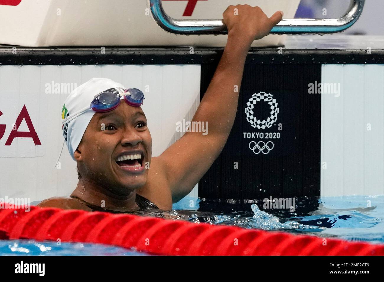 Aleka Persaud, of Guyana, finishes a women's 50-meter freestyle heat at ...