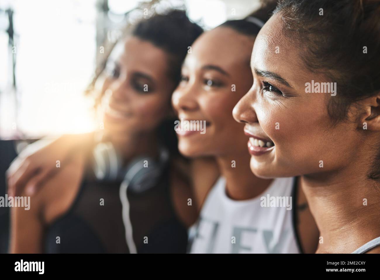 Friendship and fitness goals. a group of happy young women enjoying ...