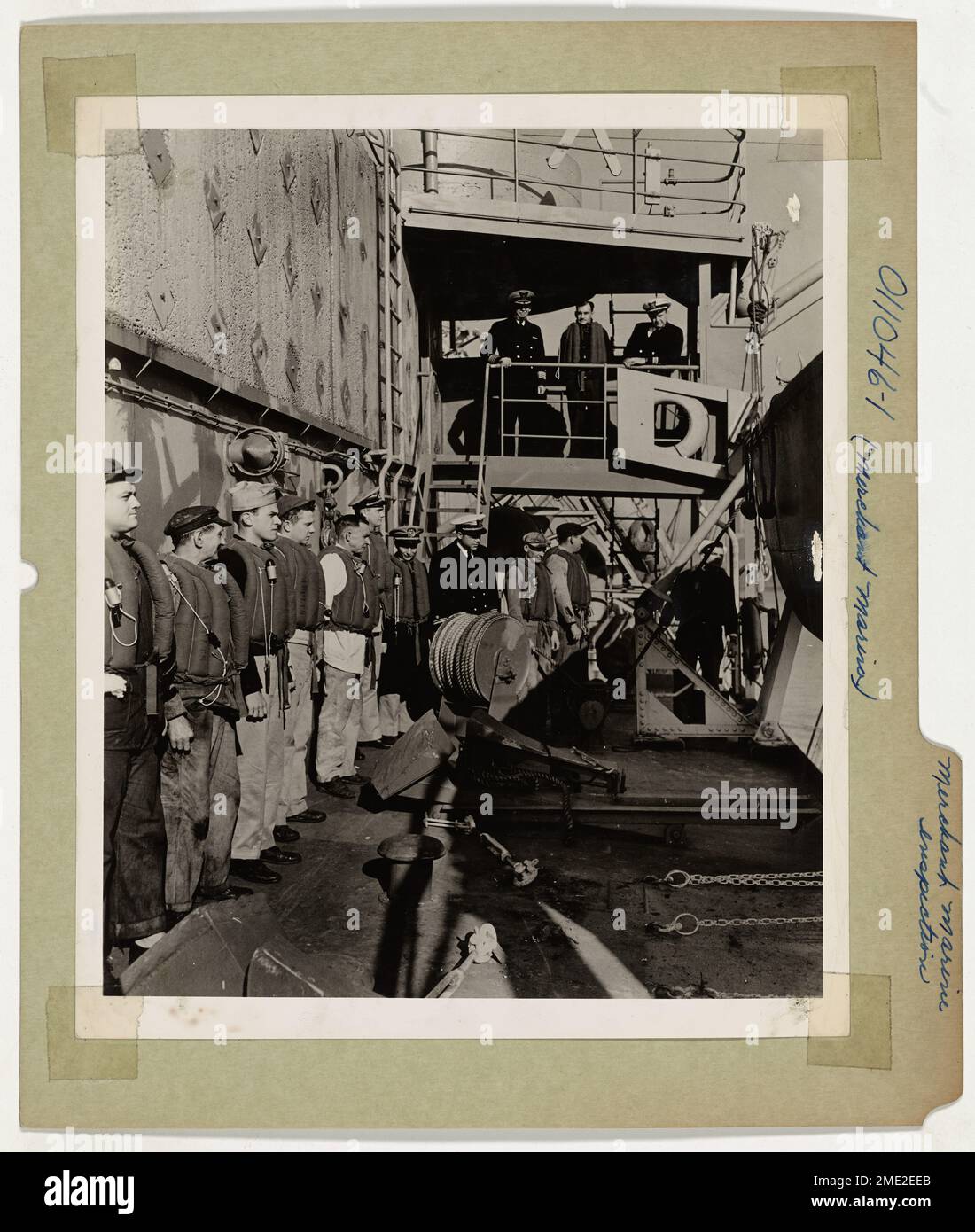 Aboard a cargo vessel in a Far Eastern port, officers from the Coast ...
