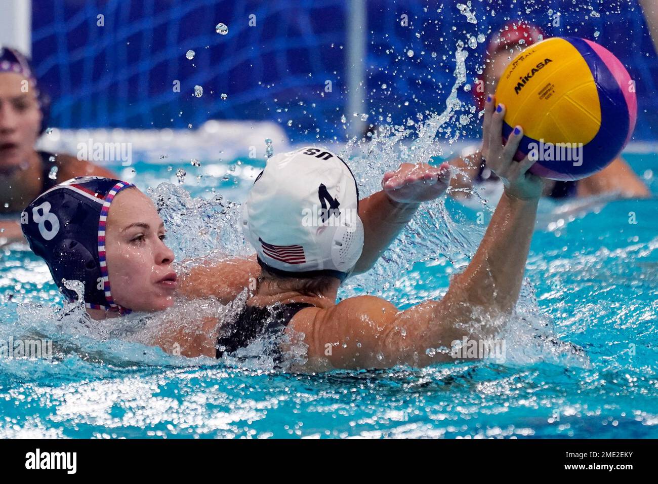 Anastasia Simanovich (8), of the Russian Olympic Committee, pressures ...