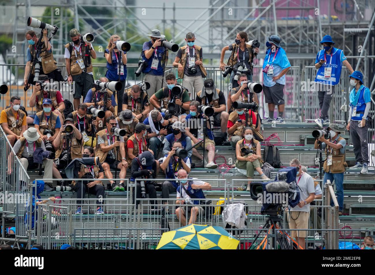 Photographers take their positions on a stand during the BMX Racing ...