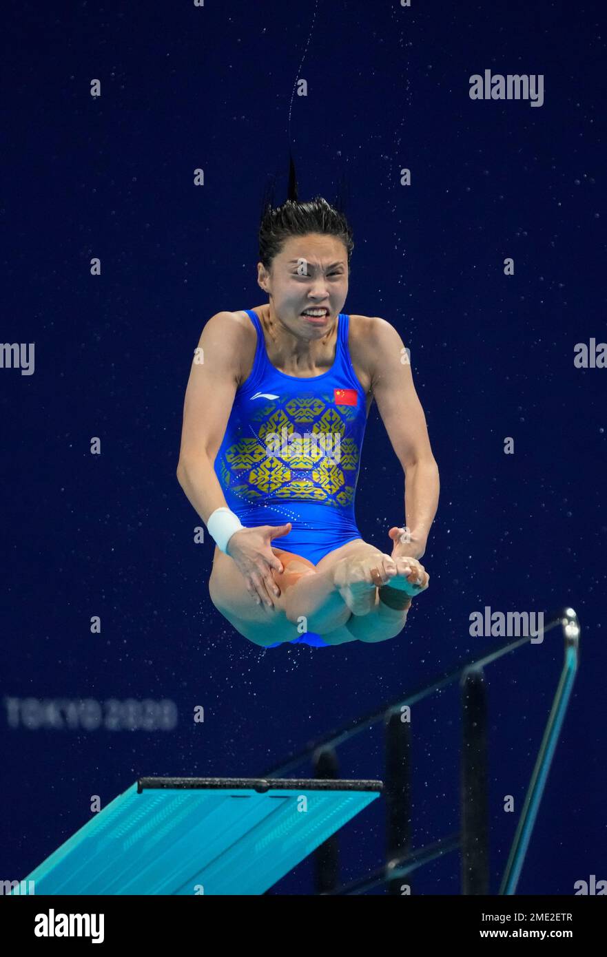 Wang Han of China competes in women's diving 3m springboard preliminary ...