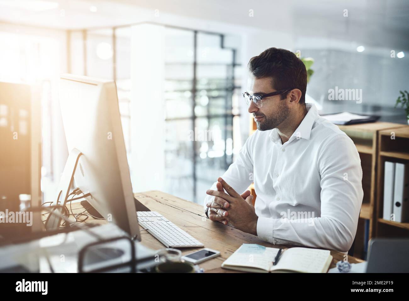 Business people stuck in a computer hi-res stock photography and images ...