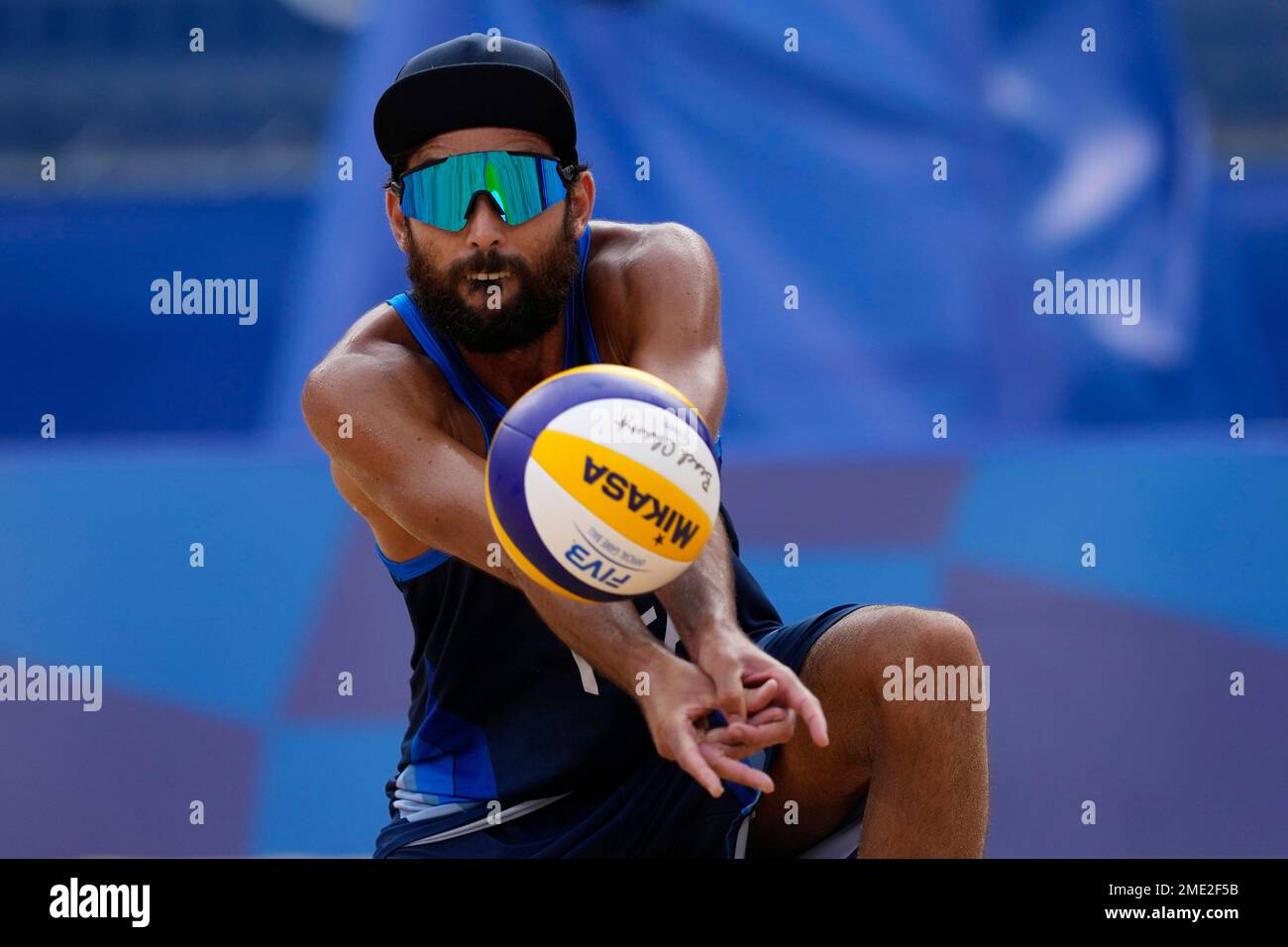 Daniele Lupo, of Italy, competes during a men's beach volleyball match ...