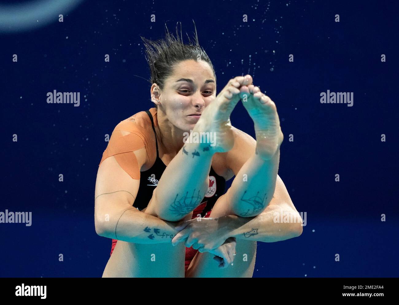 Pamela Ware of Canada competes in women's diving 3m springboard ...