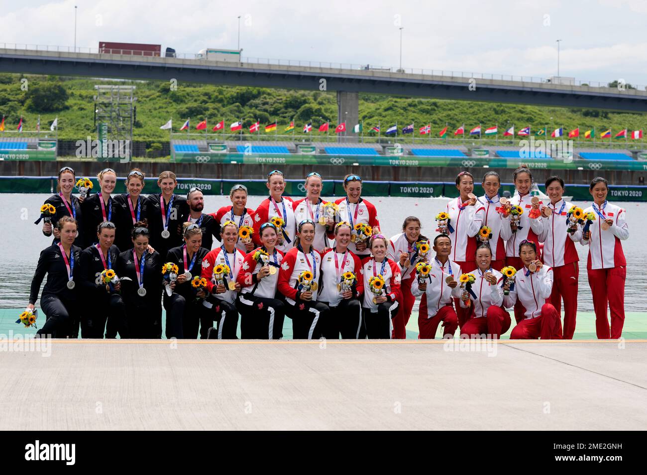 Gold medalists team Canada, center, silver medalist team New Zealand ...