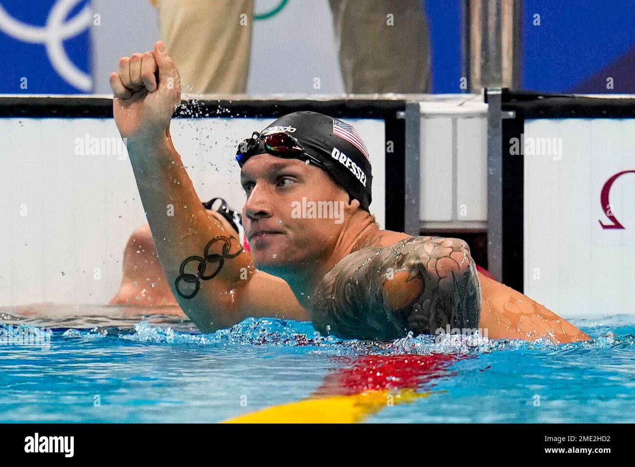 Caeleb Dressel, of United States, celebrates winning a men's 100-meter ...