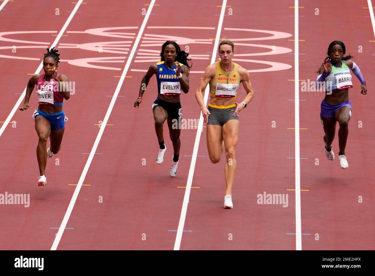 Alexandra Burghardt, of Germany, wins a heat in the women's 100-meter ...
