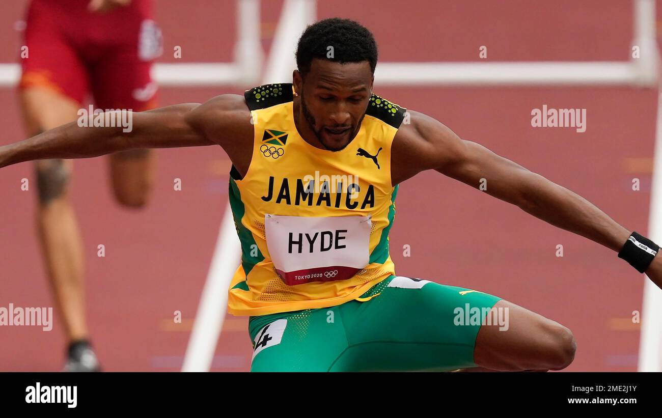 Jaheel Hyde, of Jamaica, wins a heat in the men's 400-meter hurdles at ...